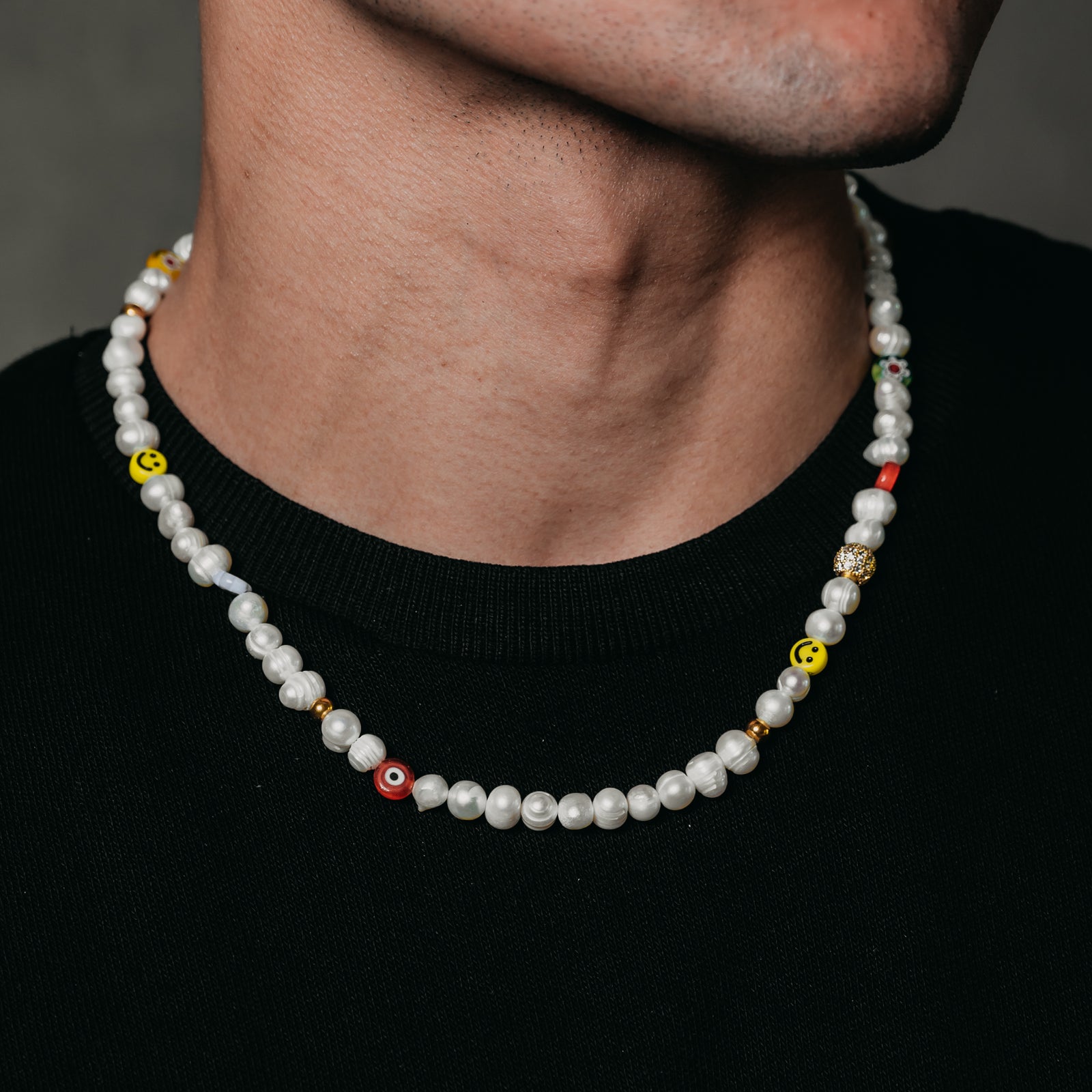 Smiley face and pearl necklace store